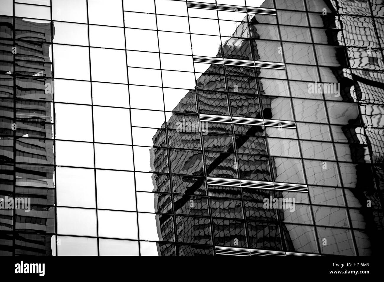 Windows of commercial building in Hong Kong with B&W color Stock Photo ...