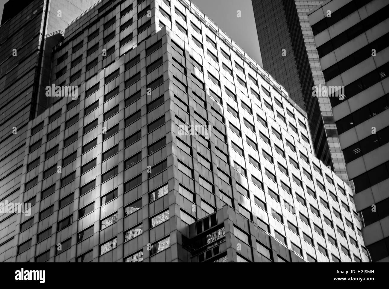 Windows of commercial building in Hong Kong with B&W color Stock Photo ...