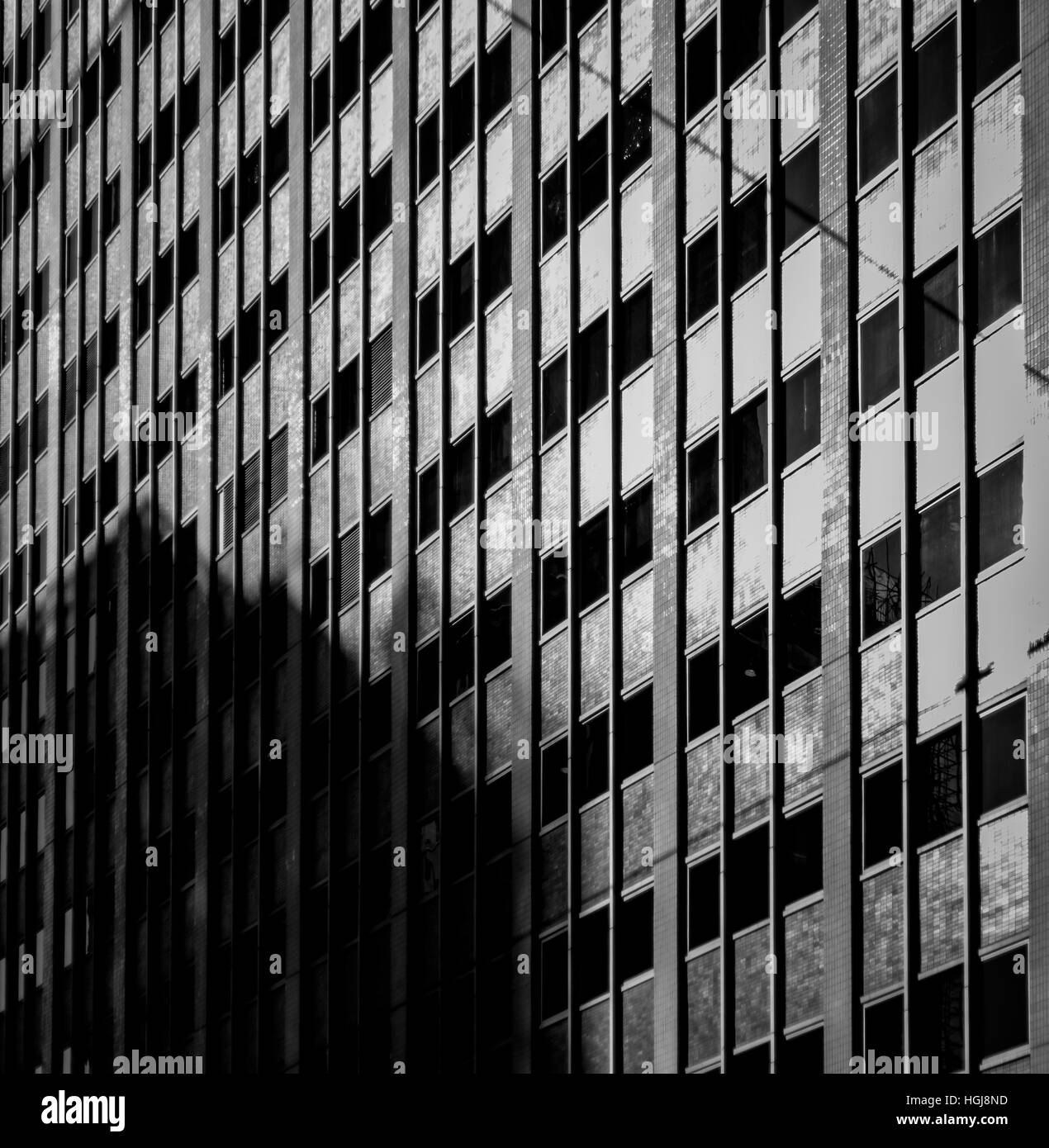 Windows of commercial building in Hong Kong with B&W color Stock Photo ...