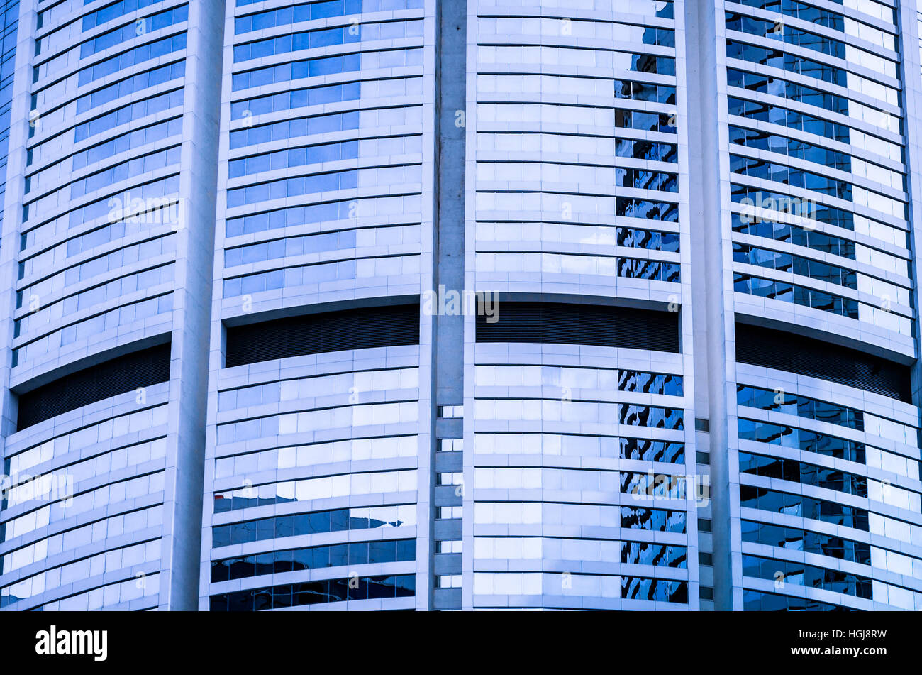 Windows of commercial building in Hong Kong Stock Photo - Alamy
