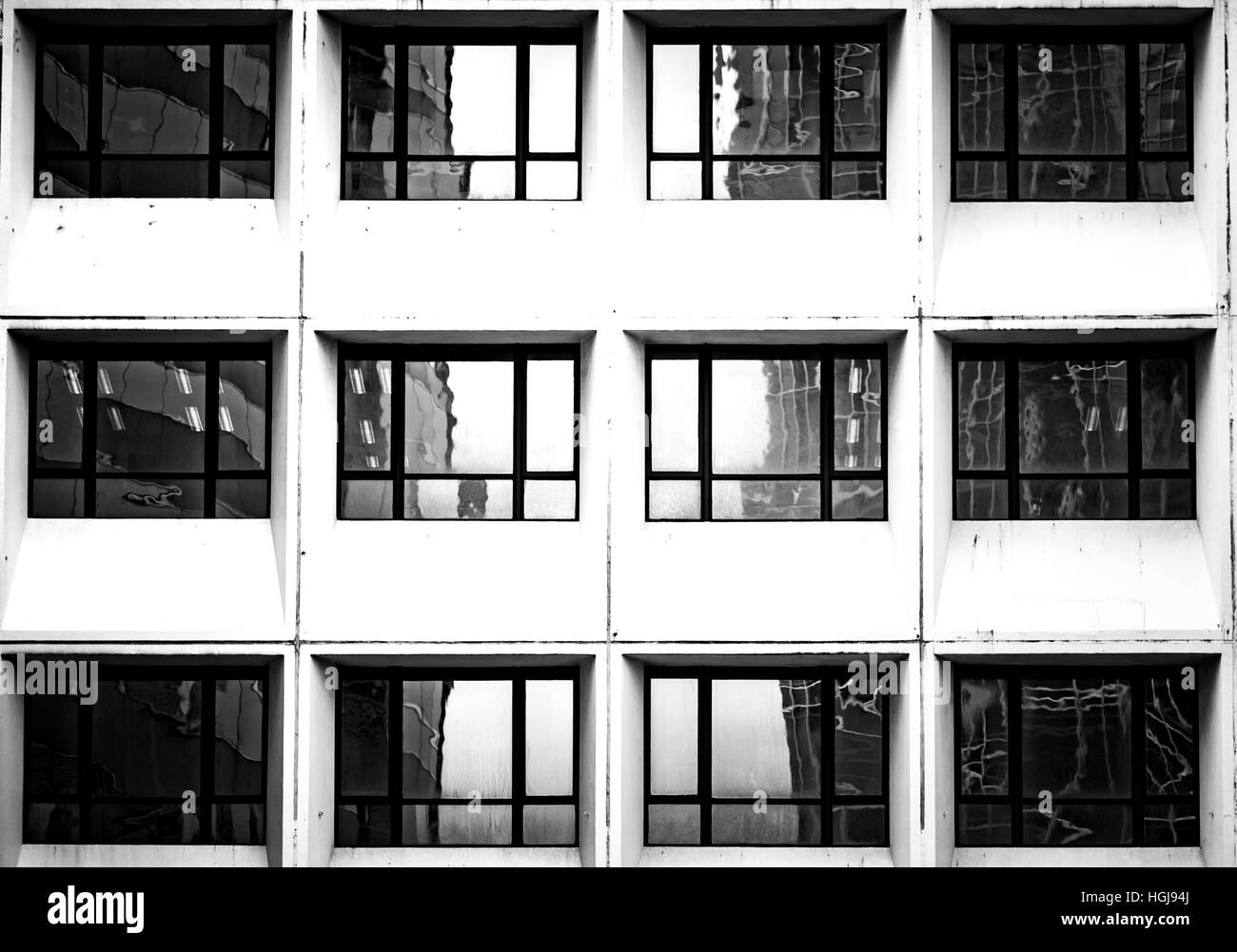 Windows of commercial building in Hong Kong with B&W color Stock Photo ...