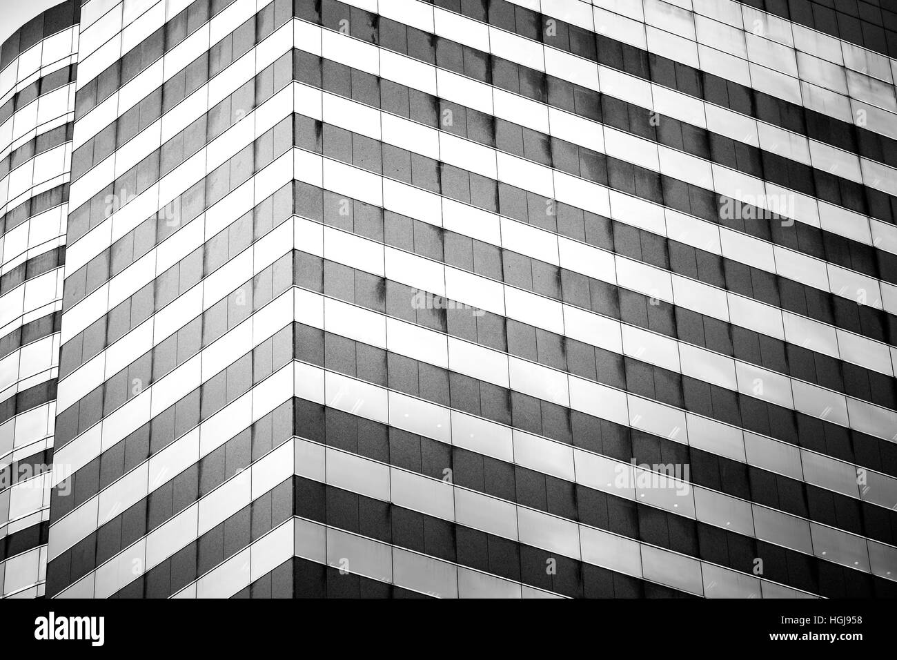 Windows of commercial building in Hong Kong with B&W color Stock Photo ...