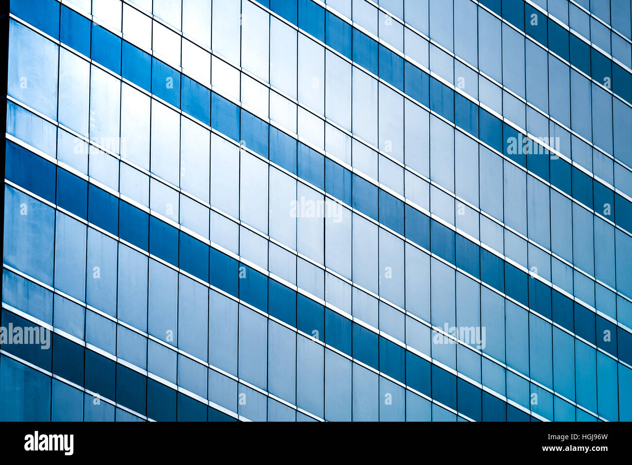 Windows of commercial building in Hong Kong Stock Photo - Alamy