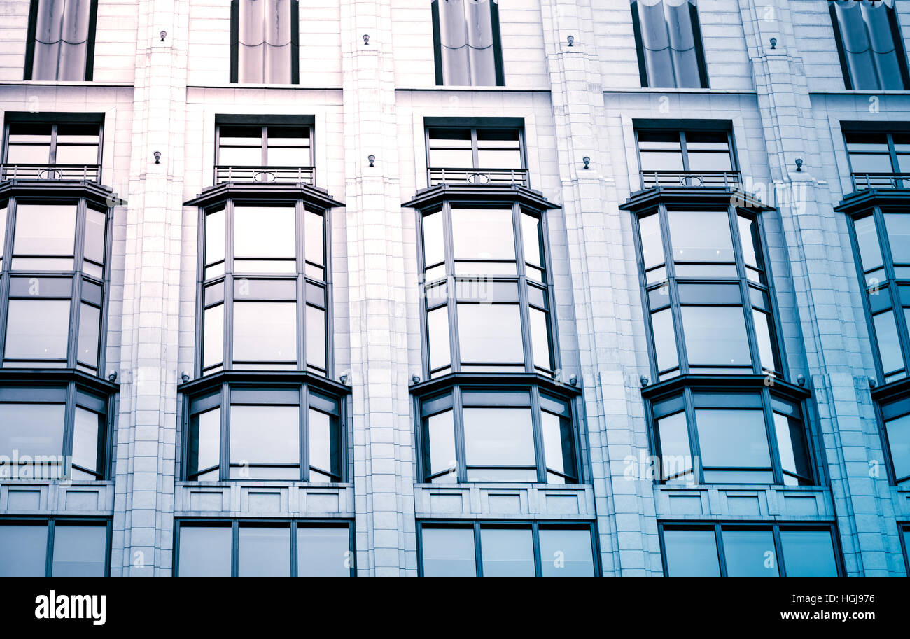 Windows of commercial building in Hong Kong Stock Photo - Alamy
