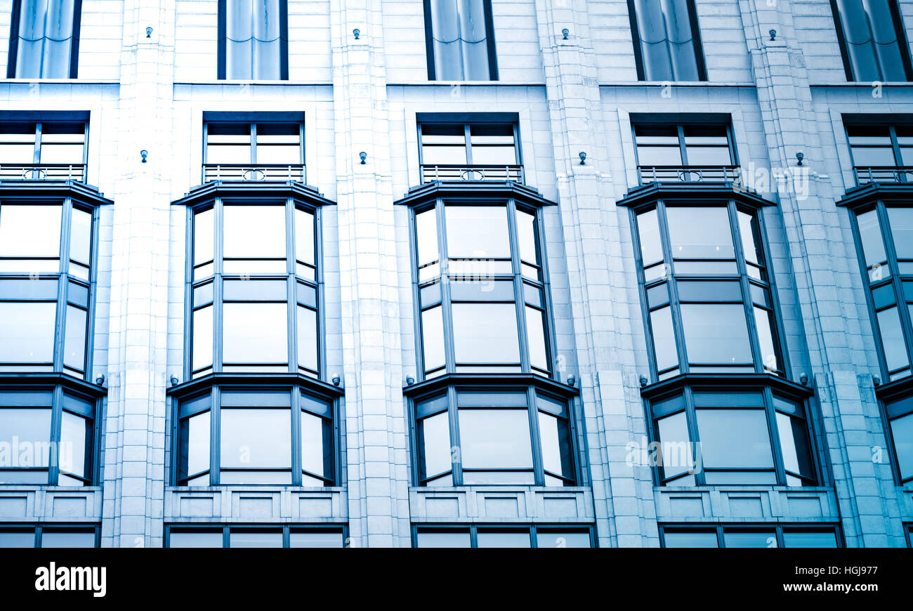 Windows of commercial building in Hong Kong Stock Photo - Alamy