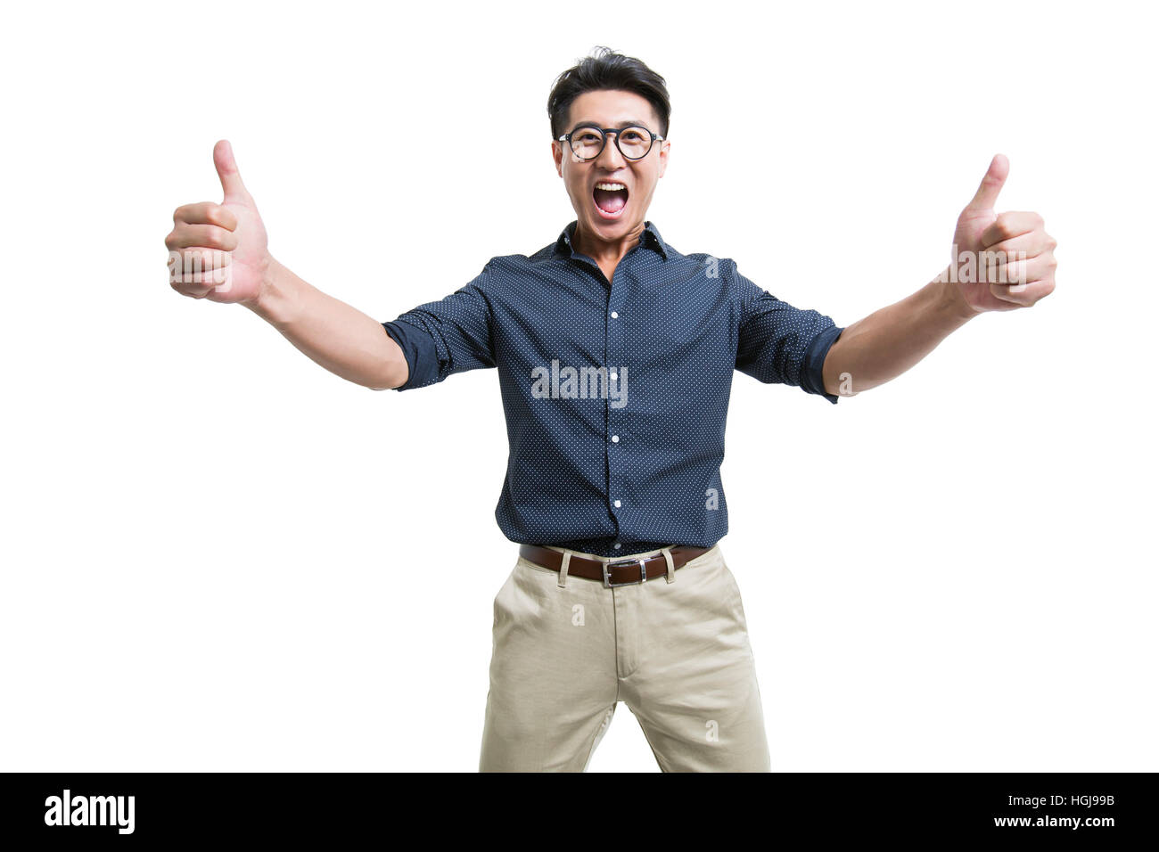 Happy young man doing thumbs up Stock Photo - Alamy