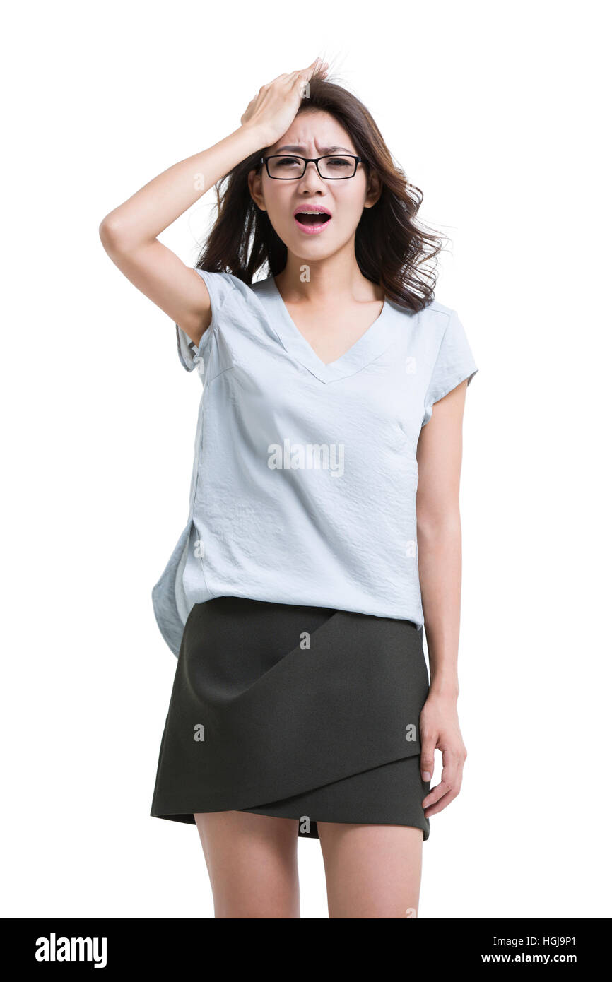 Young woman feeling regretful Stock Photo - Alamy
