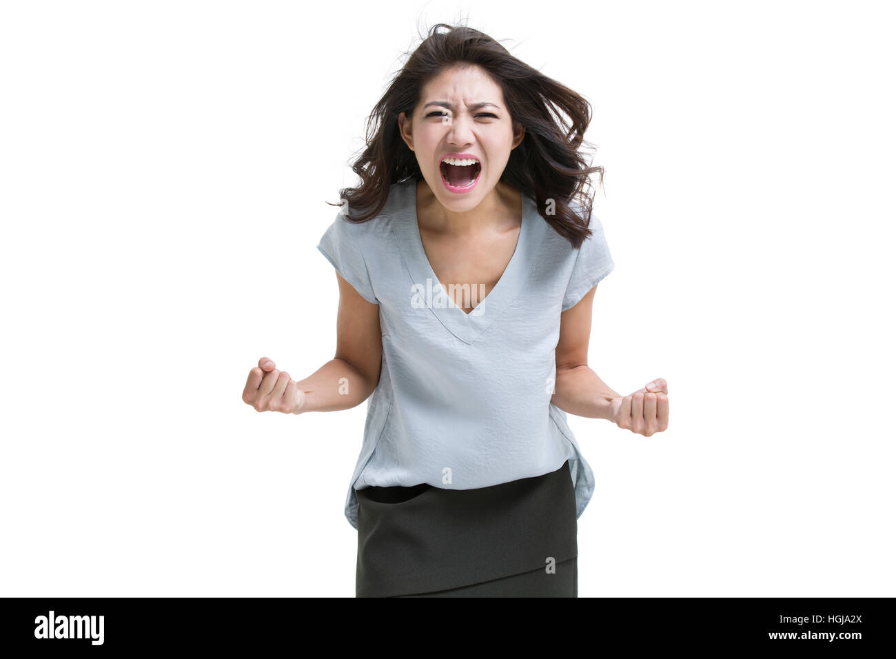 Angry young woman shouting Stock Photo - Alamy