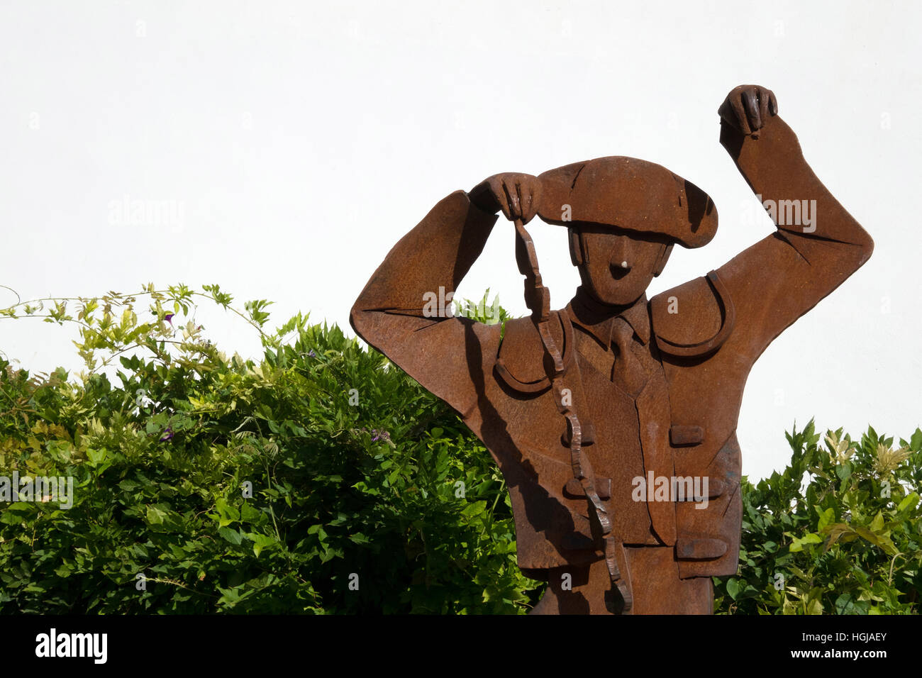 Rusted metal statue of matador bull fighter banderillero outside Plaza ...