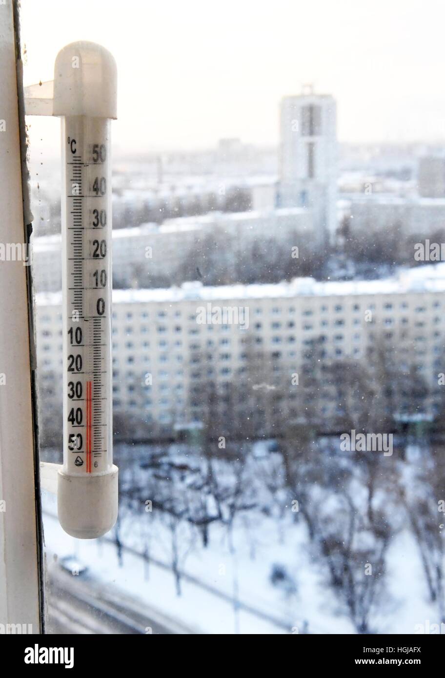 January 6, 2017. - Russia, Moscow. - Outdoor thermometer on a window ...
