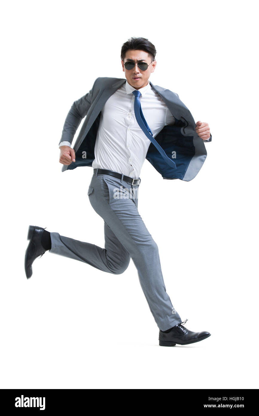 Indian businessman running hi-res stock photography and images - Alamy