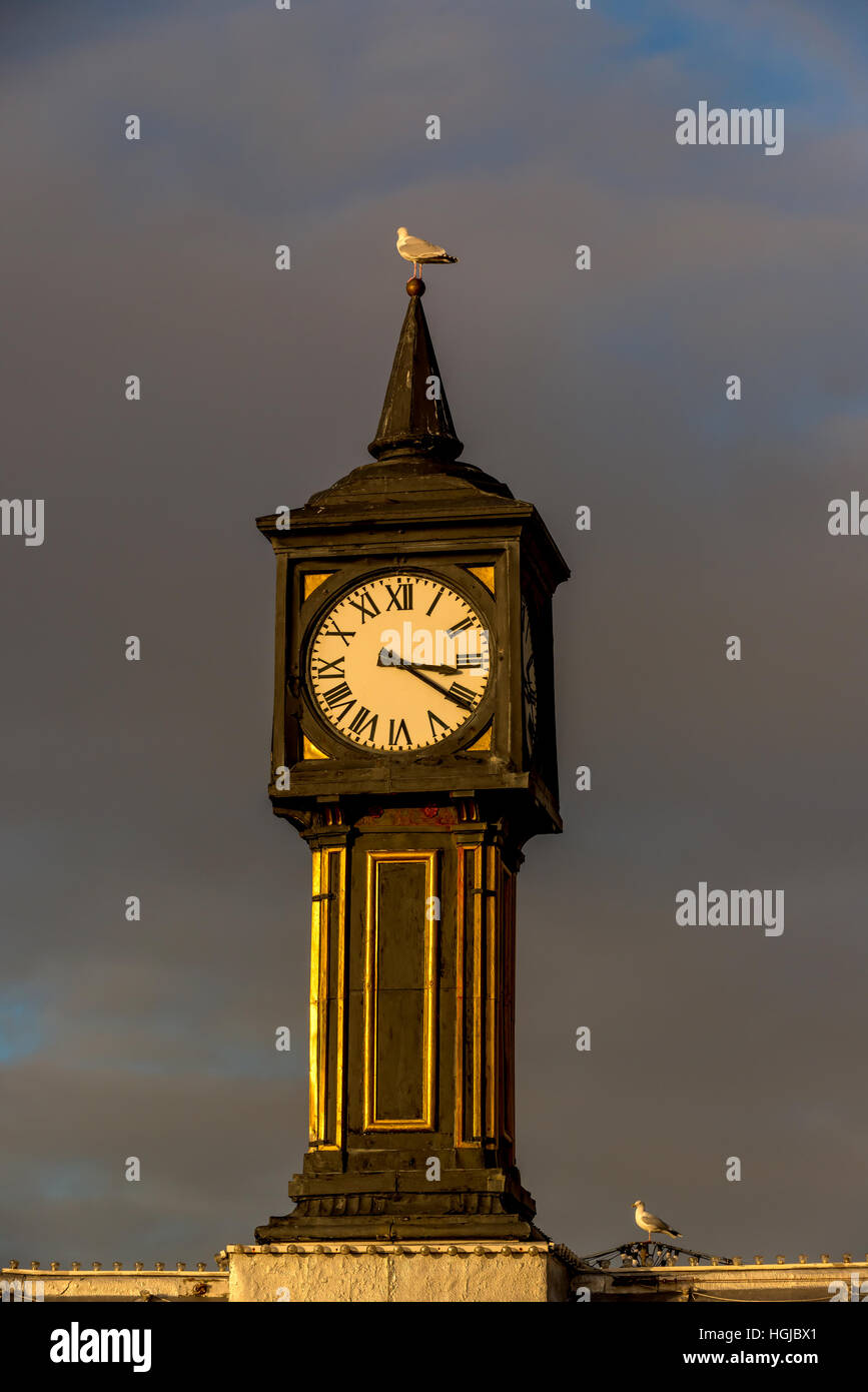 Golden light on the seafront at Brighton making the Regency buildings ...