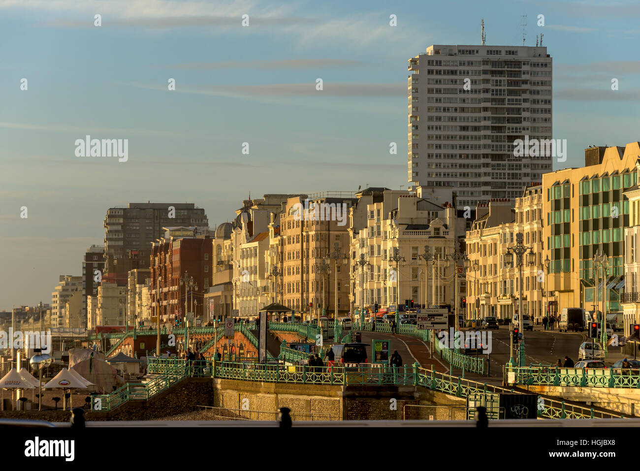 Golden light on the seafront at Brighton making the Regency buildings ...