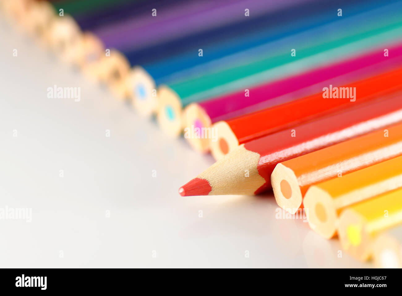 Line of pencils with one alone and individual pencil Stock Photo - Alamy