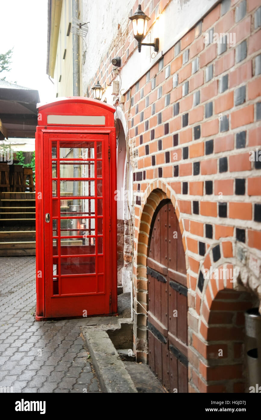 Phone booth of red color Stock Photo - Alamy