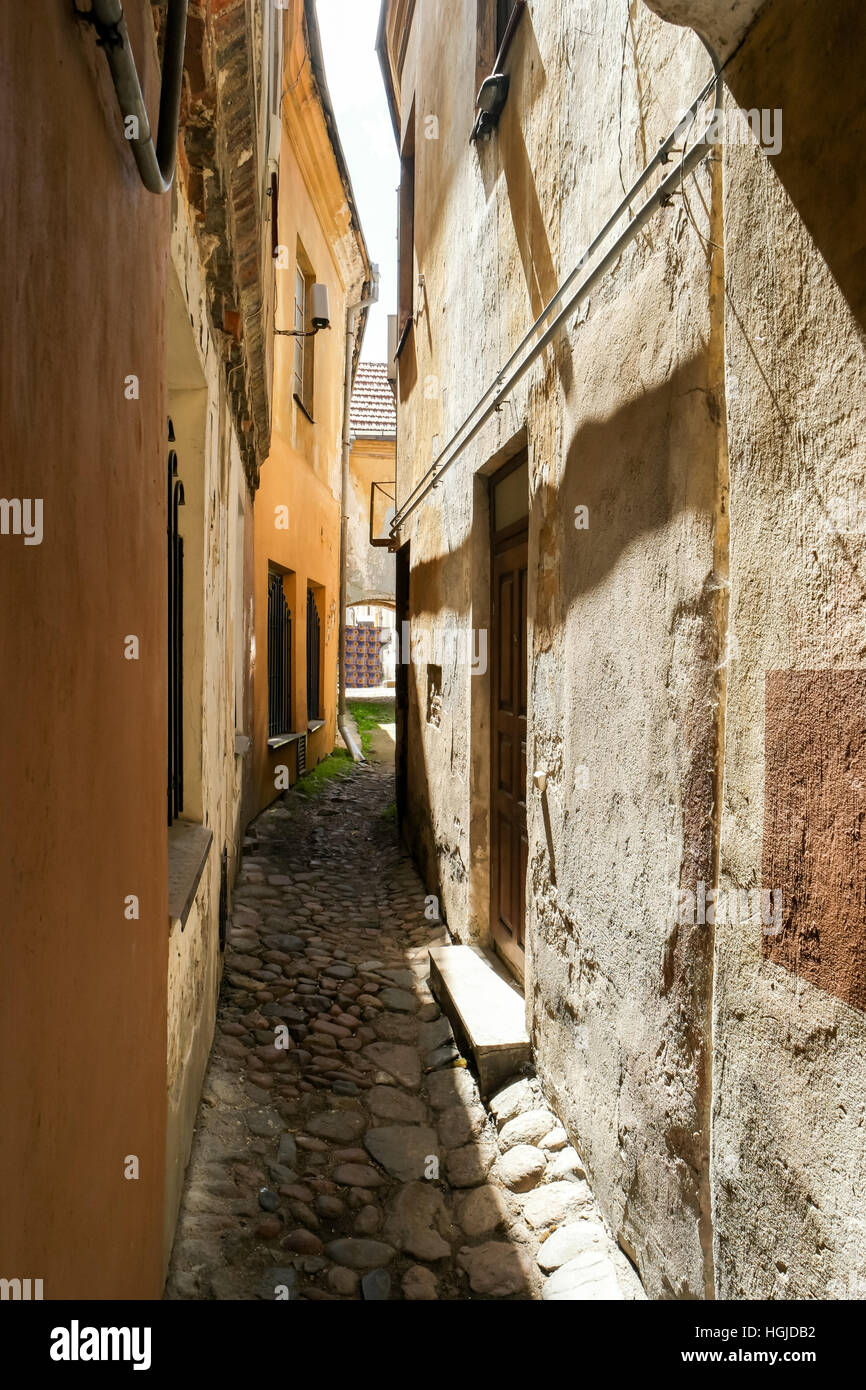 Narrow path between houses Stock Photo - Alamy