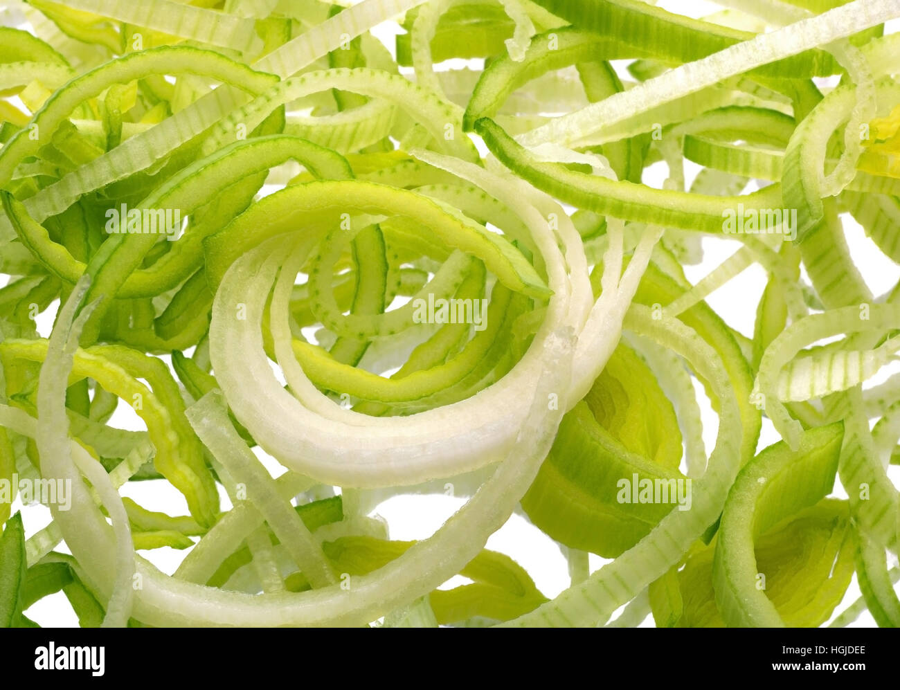 Chopped Leek vegetable closeup view background Stock Photo - Alamy