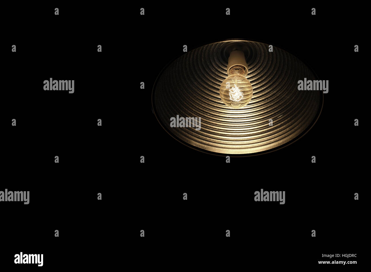 turn on light bulbs in hanging lamp, daylight lamp Stock Photo - Alamy
