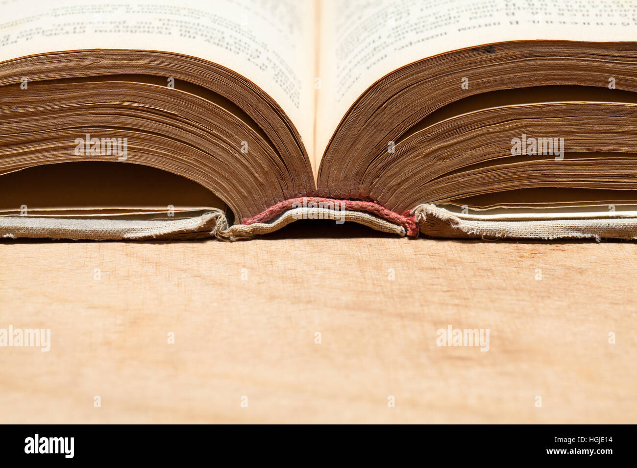 Open old book. Selective focus Stock Photo - Alamy