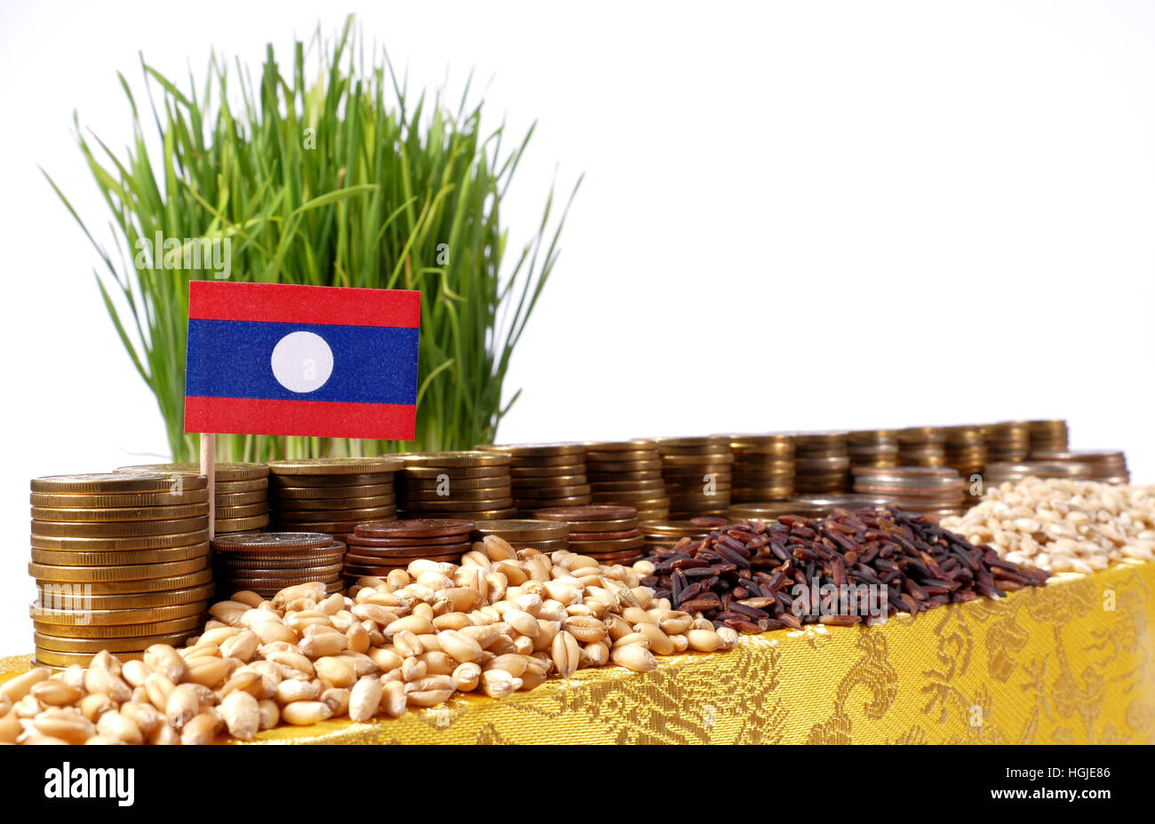 Laos flag waving with stack of money coins and piles of wheat and rice ...