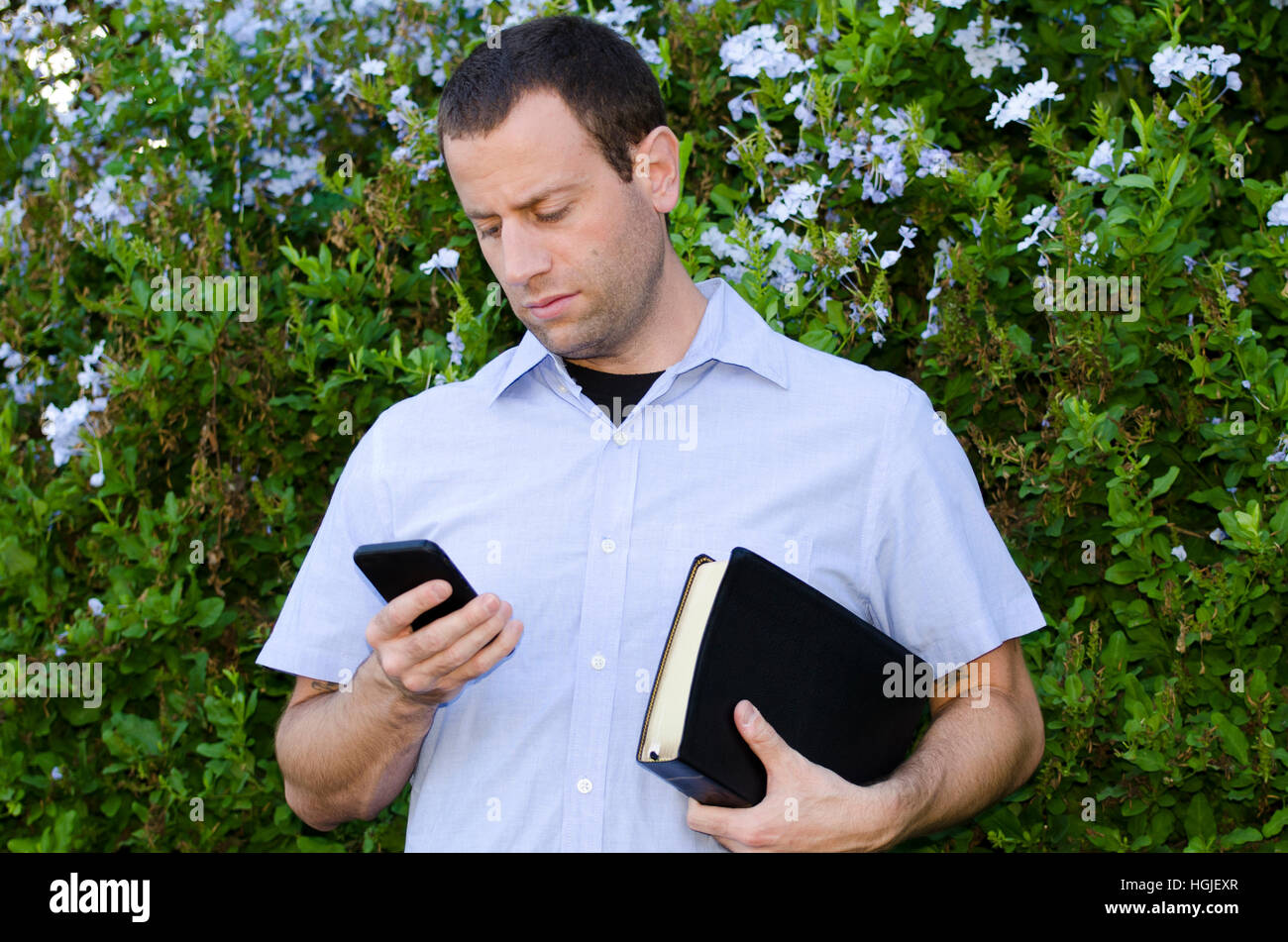 Cell phone and bible hi-res stock photography and images - Alamy