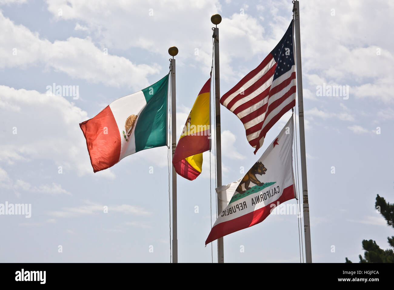 American, Californian, flags on the grounds of Mission San Luis Rey in ...