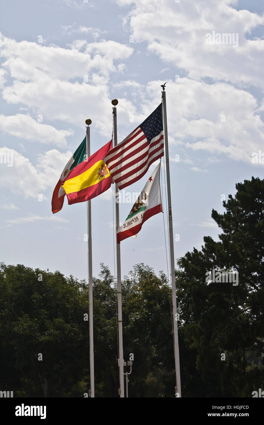 American, Californian, flags on the grounds of Mission San Luis Rey in ...