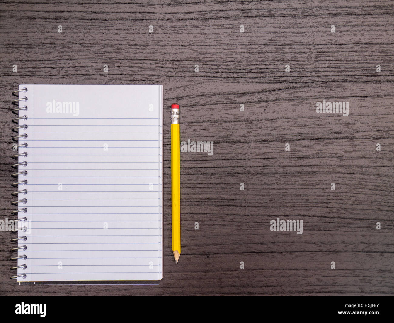 Wood Desktop, Spiral Notebook, Pencil on Desk Stock Photo - Alamy