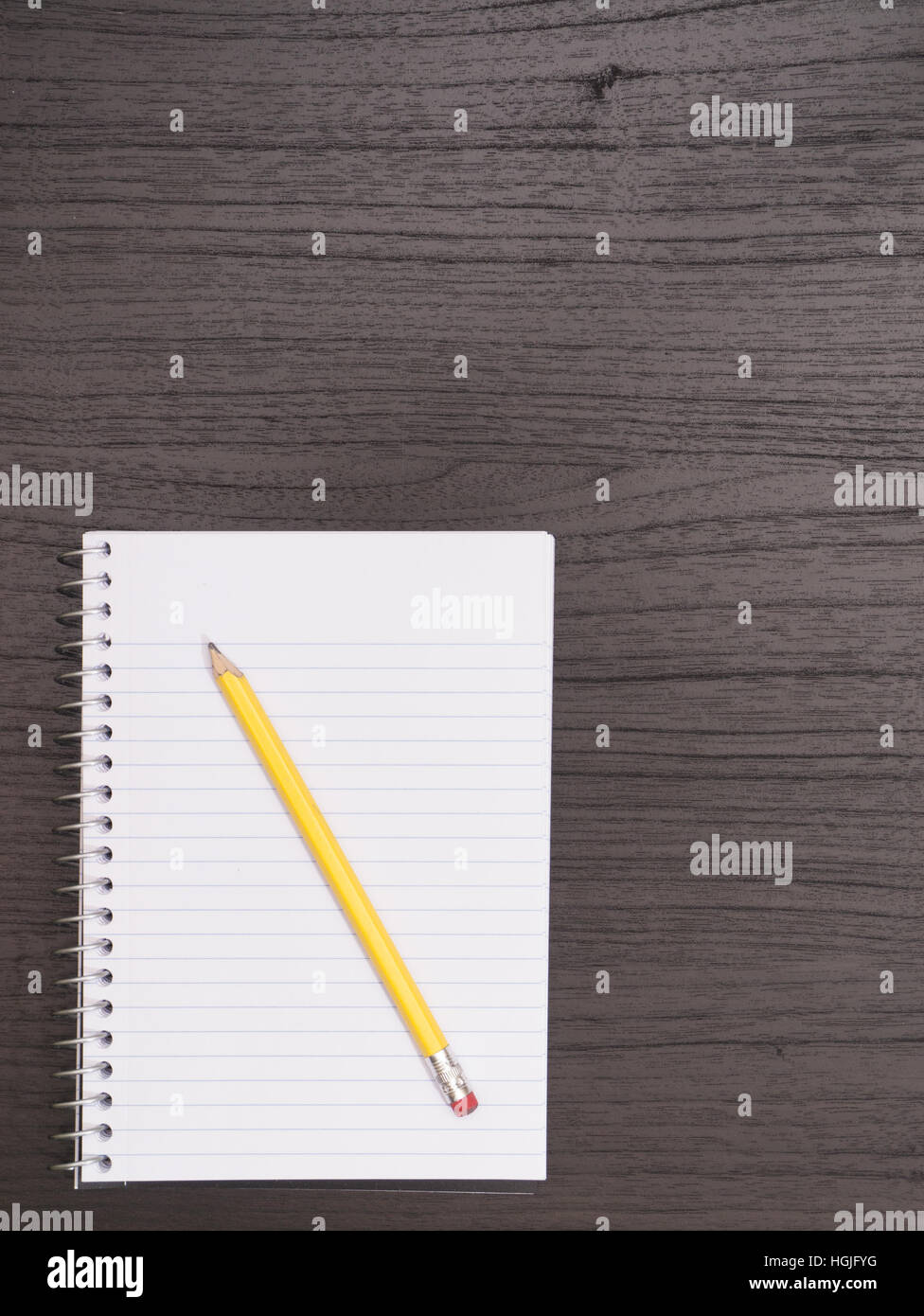 Desktop With Spiral Notebook, Pencil Stock Photo - Alamy