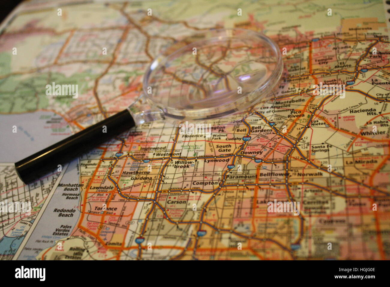 Map and Magnifying Glass Stock Photo - Alamy