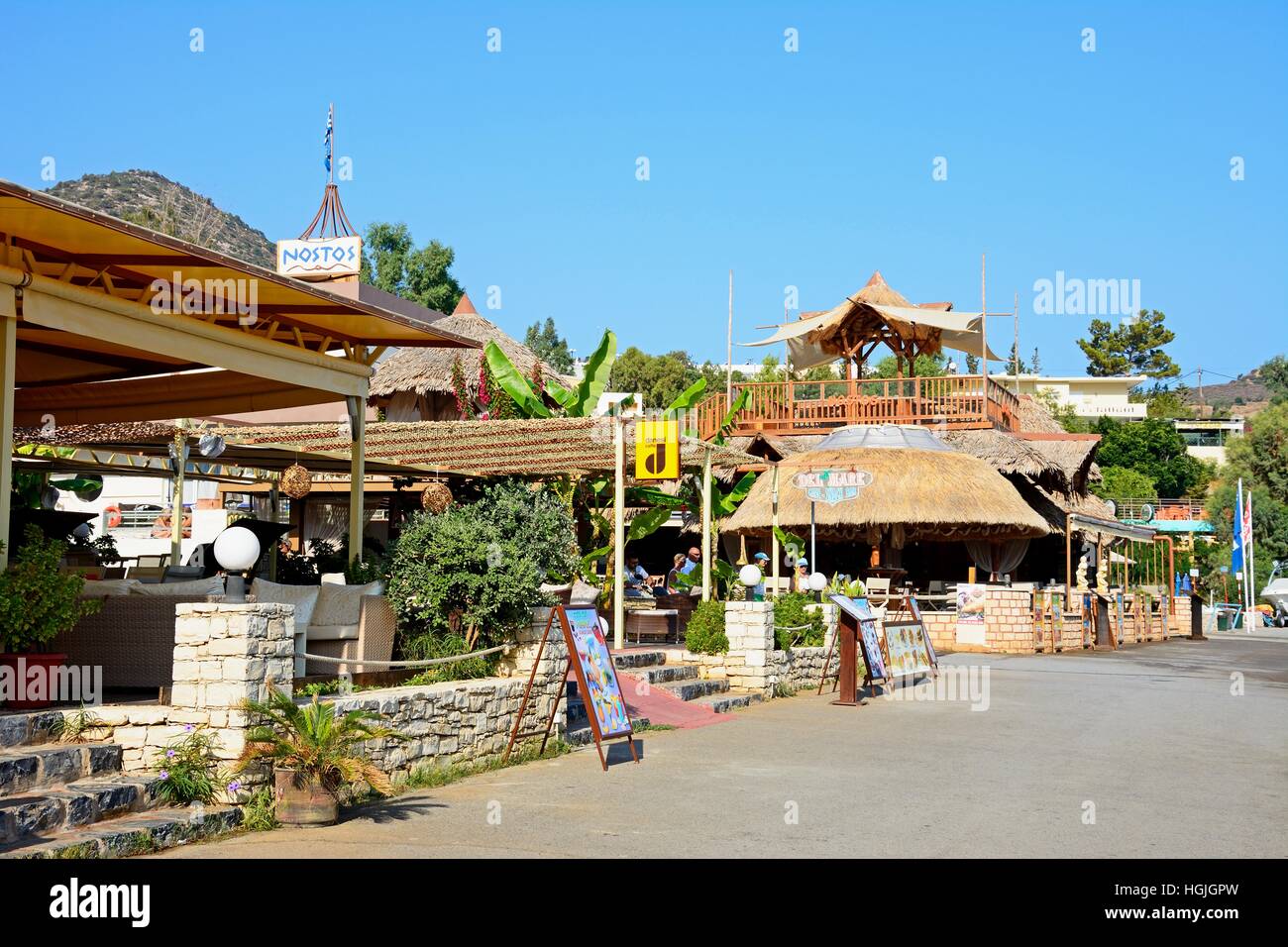 Restaurants along the promenade at Livadi Beach, Bali, Crete, Greece ...