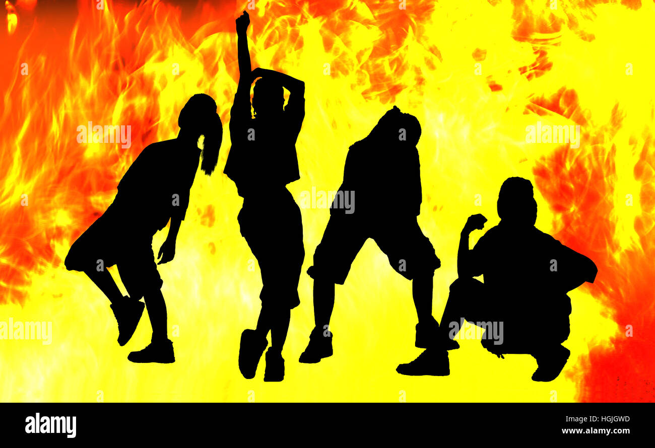Shadow of four girls dancing in fire background Stock Photo - Alamy