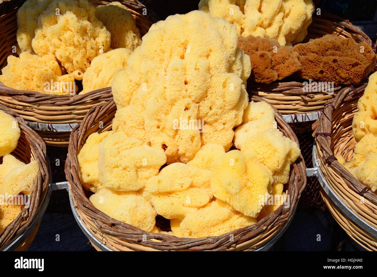 Natural sponges for sale in wicker baskets along the waterfront, Chania ...