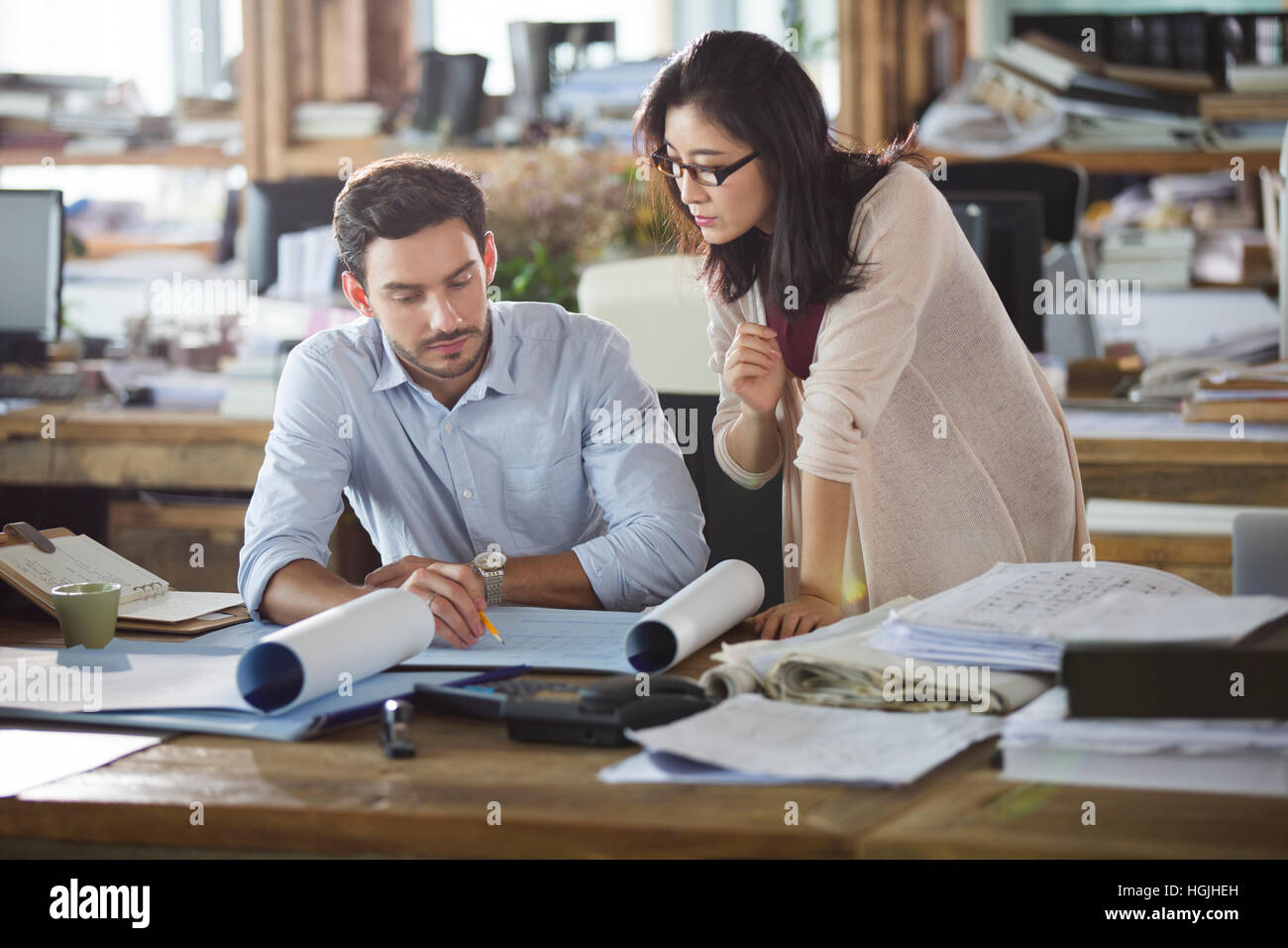 Architects working in the office Stock Photo - Alamy
