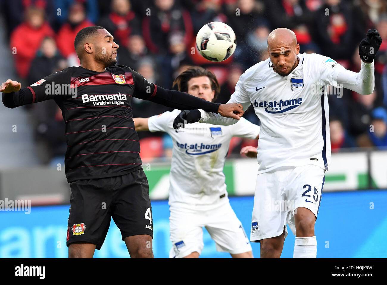 Leverkusen's Jonathan Tah (L) and Hertha'sJohn Anthony Brooks vie for ...