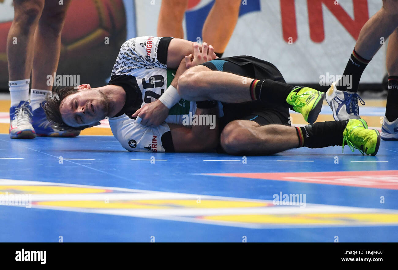 Paris, France. 22nd Jan, 2017. Germany's Kai Haefner lies on the floor ...