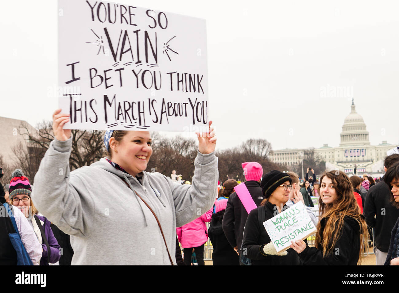 Protesters hold signs hi-res stock photography and images - Alamy