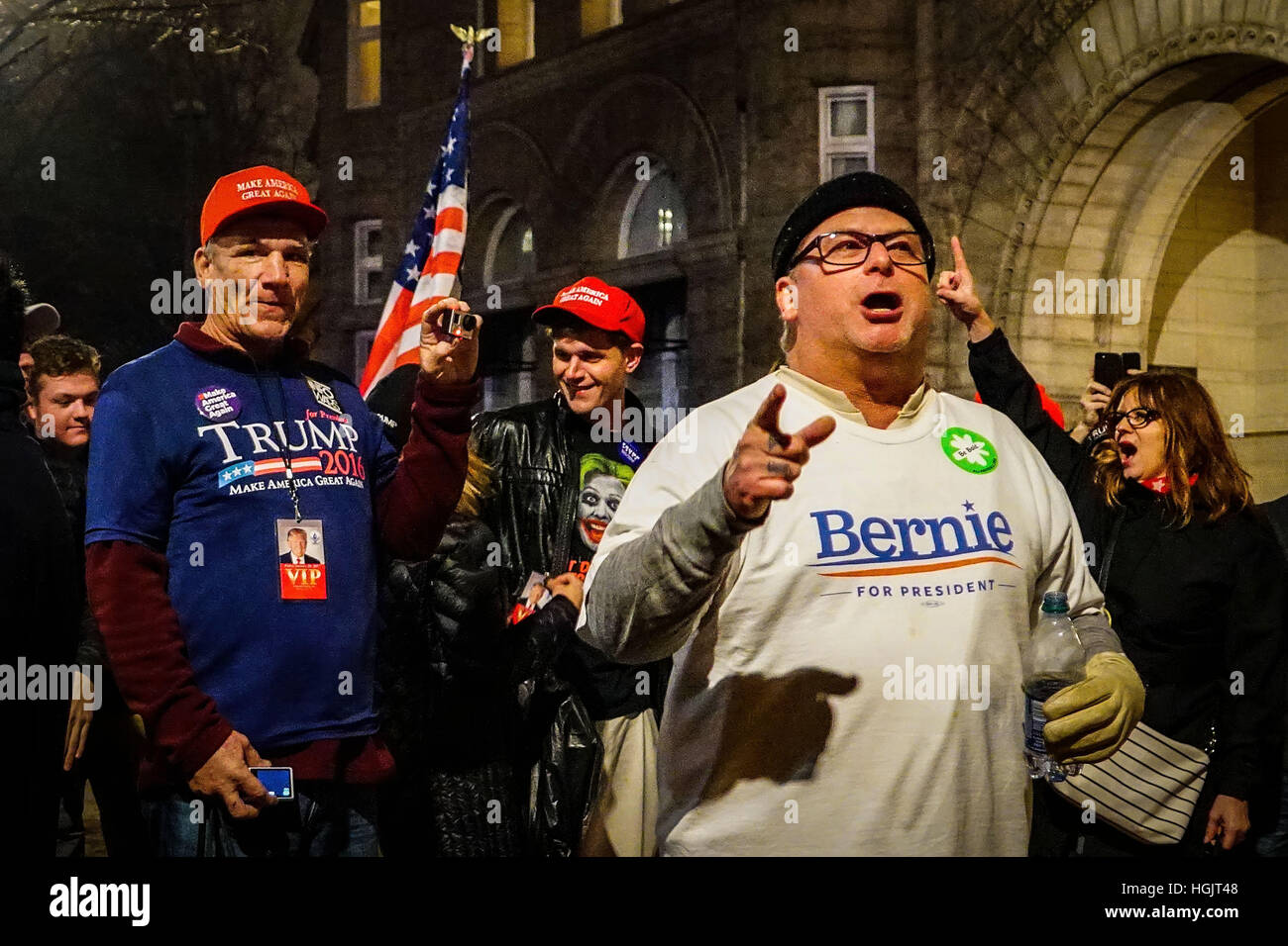 Donald Trump supporters stand in front of the Trump International Hotel ...