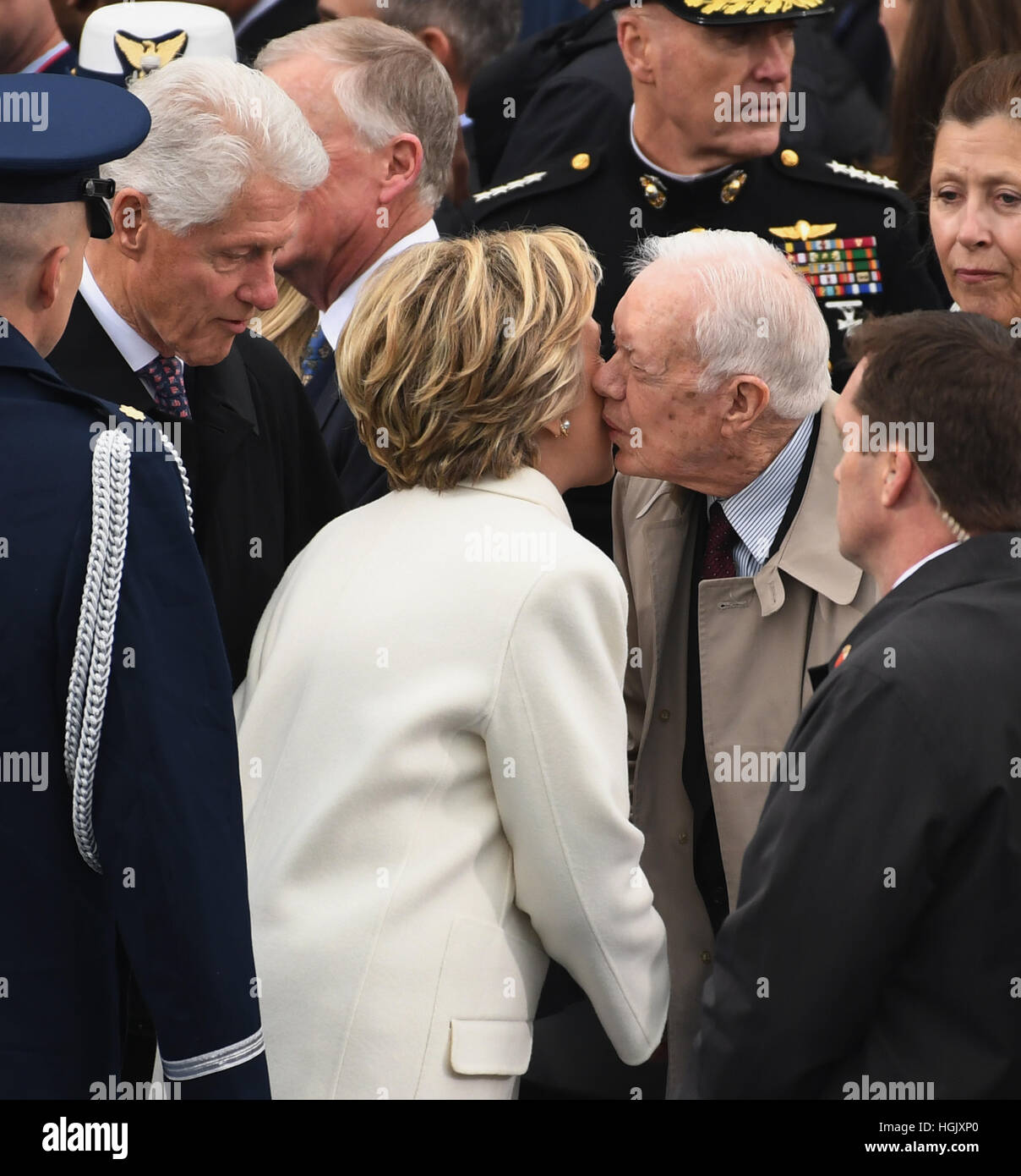 Former President Jimmy Carter kisses Hillary Clinton on the cheek as ...