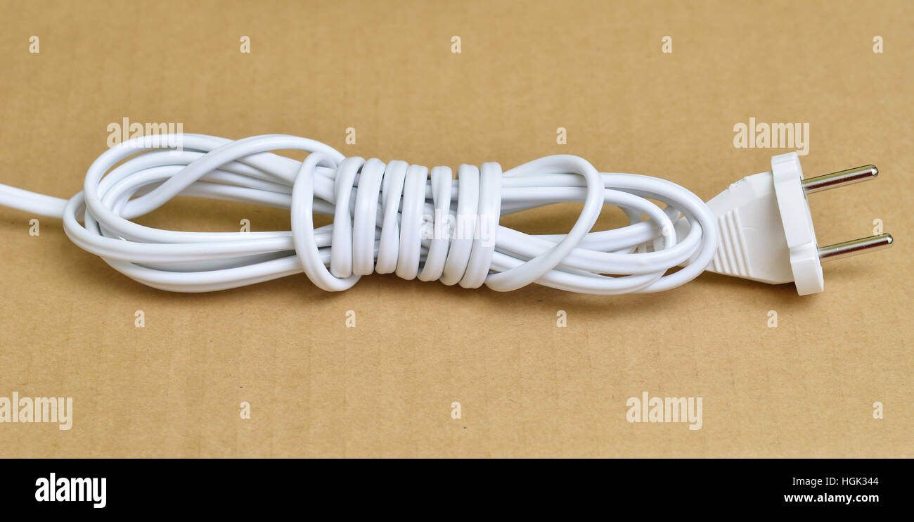 Plugged in electric devices in an extension cord Stock Photo - Alamy