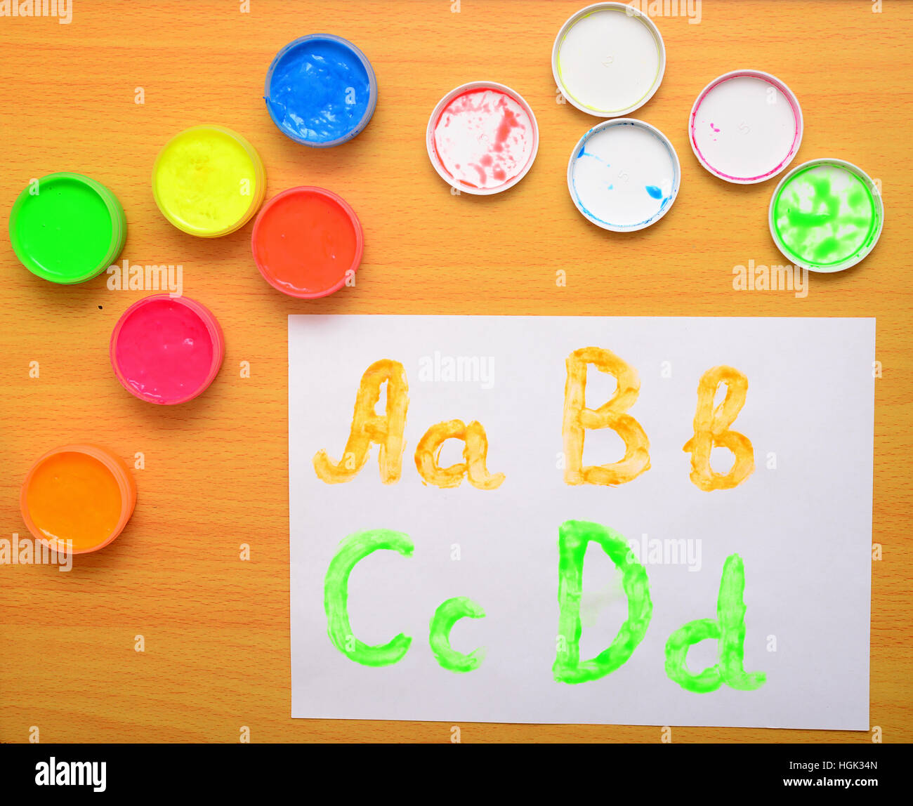 finger paints and drawing on the table Stock Photo - Alamy