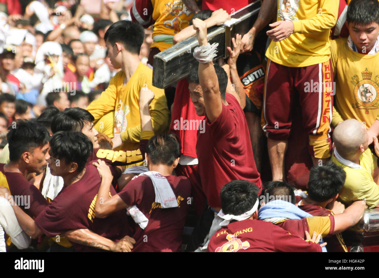Manila, Philippines. 09th Jan, 2017. A devotee cheers wildly after ...