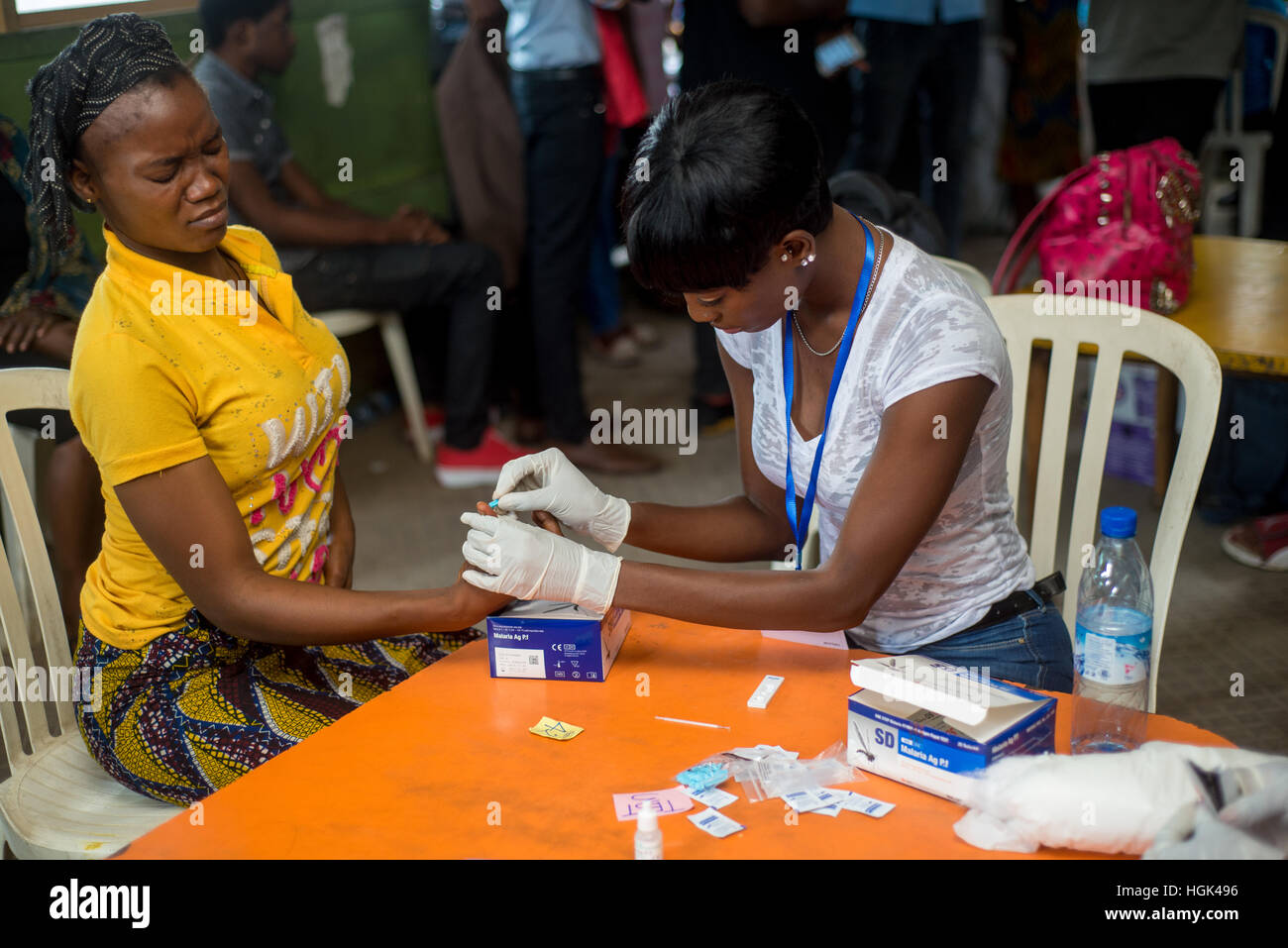 A woman undergoing a blood test Stock Photo - Alamy
