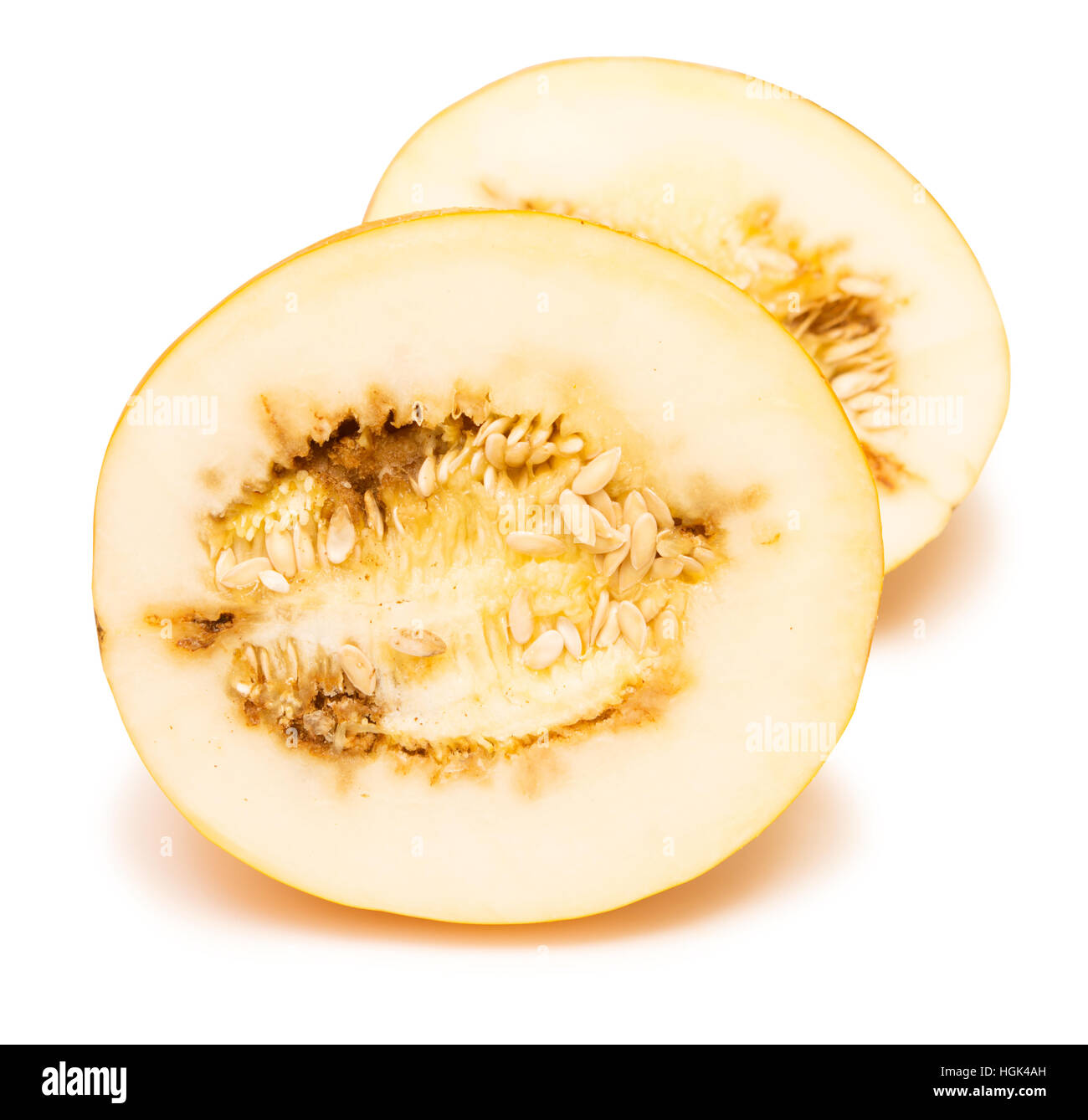 Yellow rotten melon slices on white background Stock Photo - Alamy