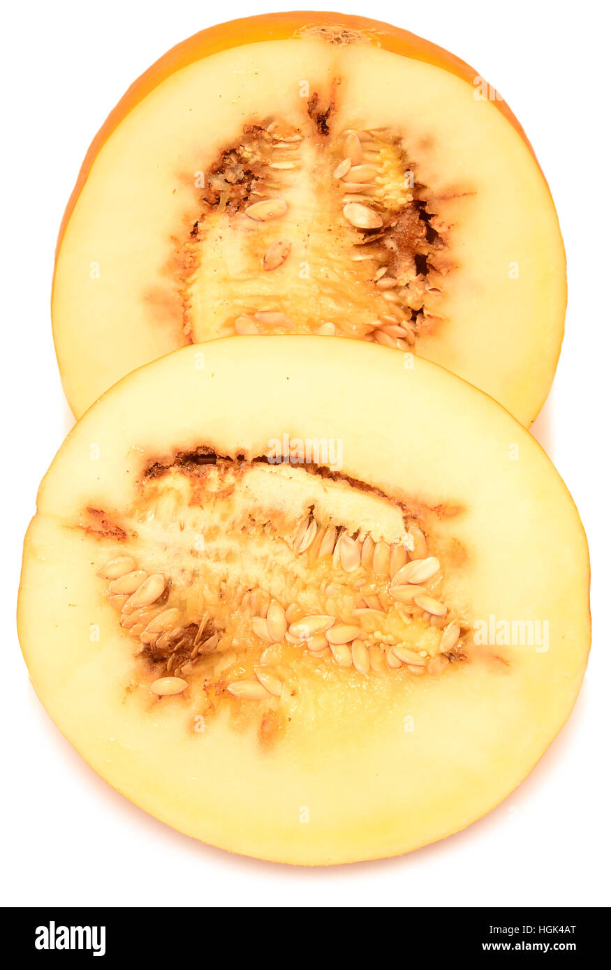 Yellow rotten melon slices on white background Stock Photo - Alamy