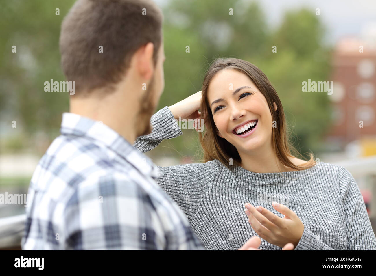 Two people facing each other talking hi-res stock photography and ...