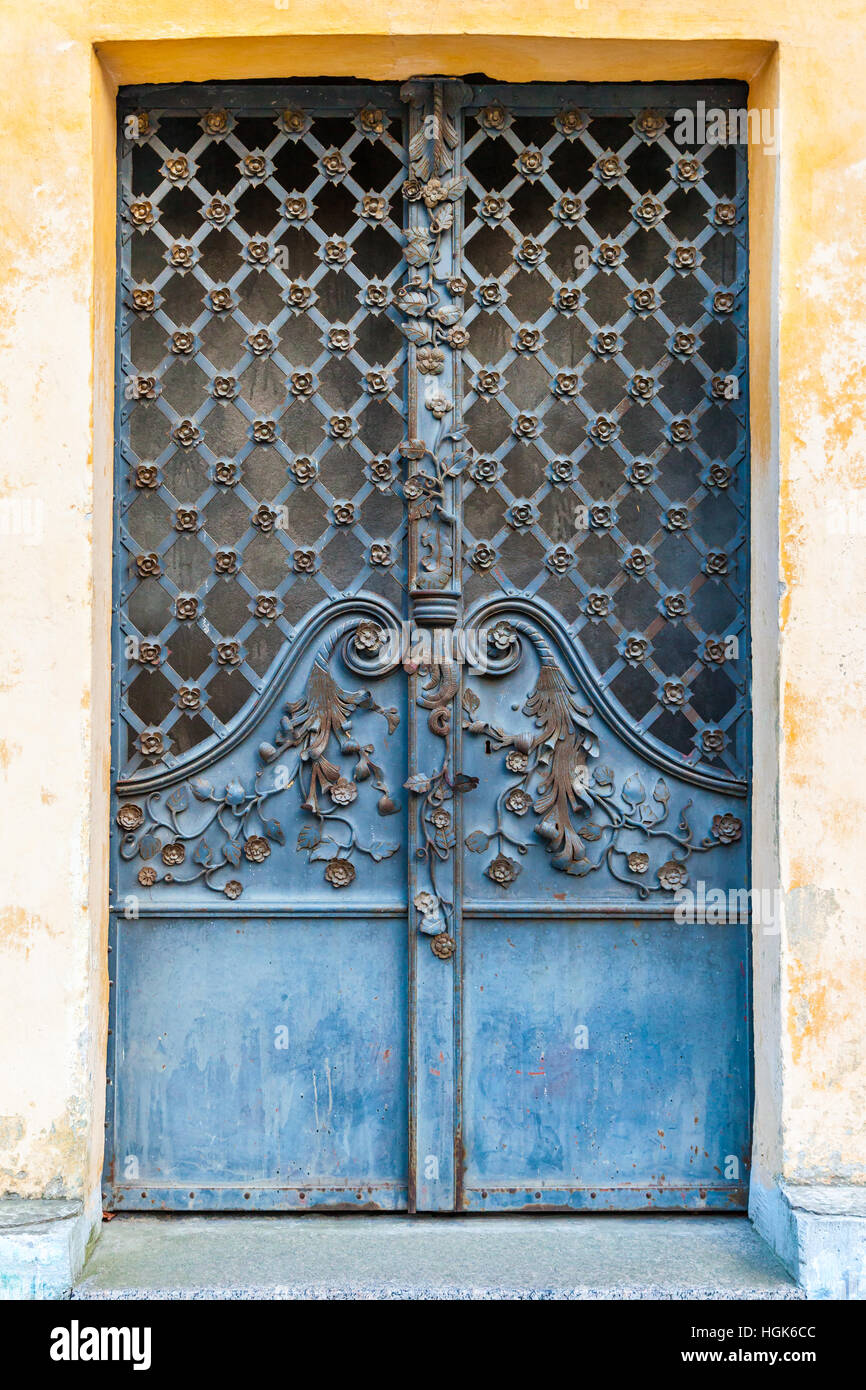 Vintage door with ornament on a old building facade Stock Photo - Alamy