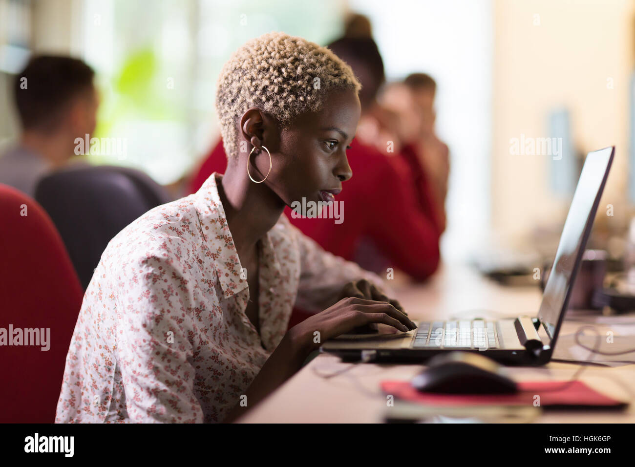 Programmer working at software development company office Stock Photo ...