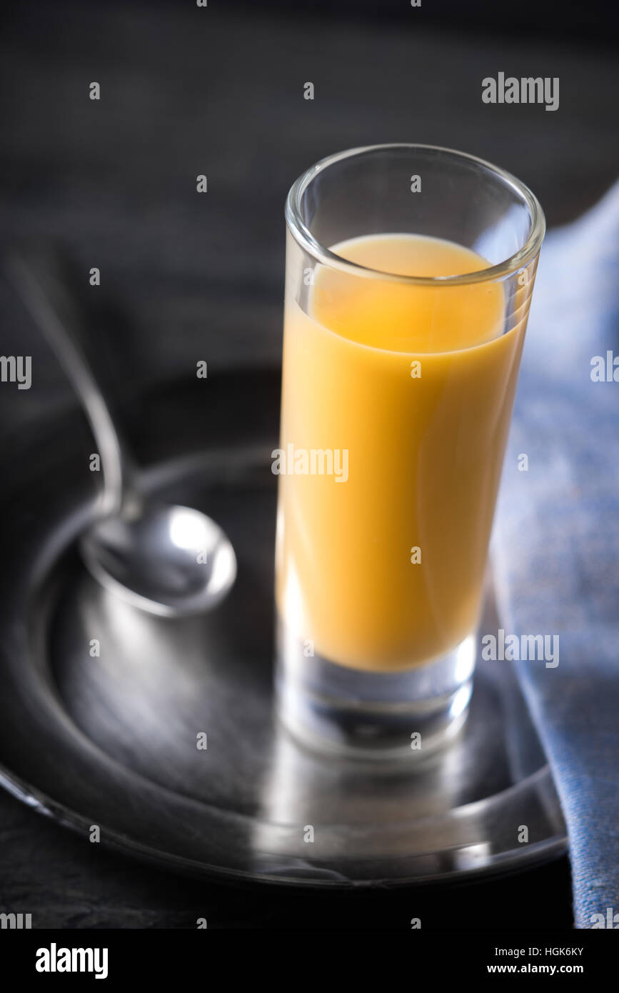 Liqueur Advocaat on the dark background Stock Photo - Alamy