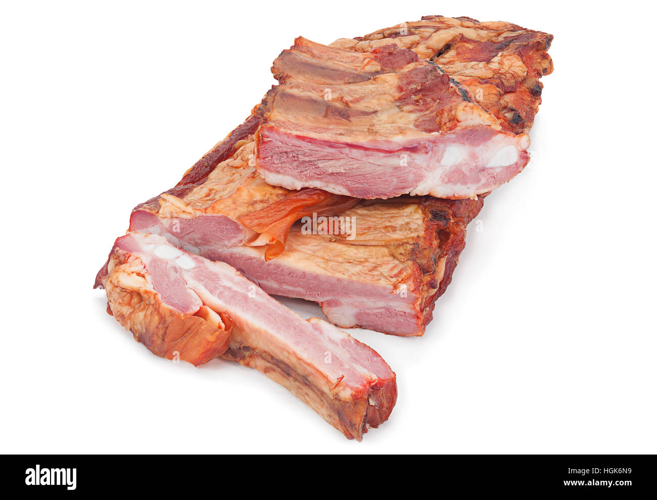 Smoked pork ribs isolated on white background Stock Photo - Alamy